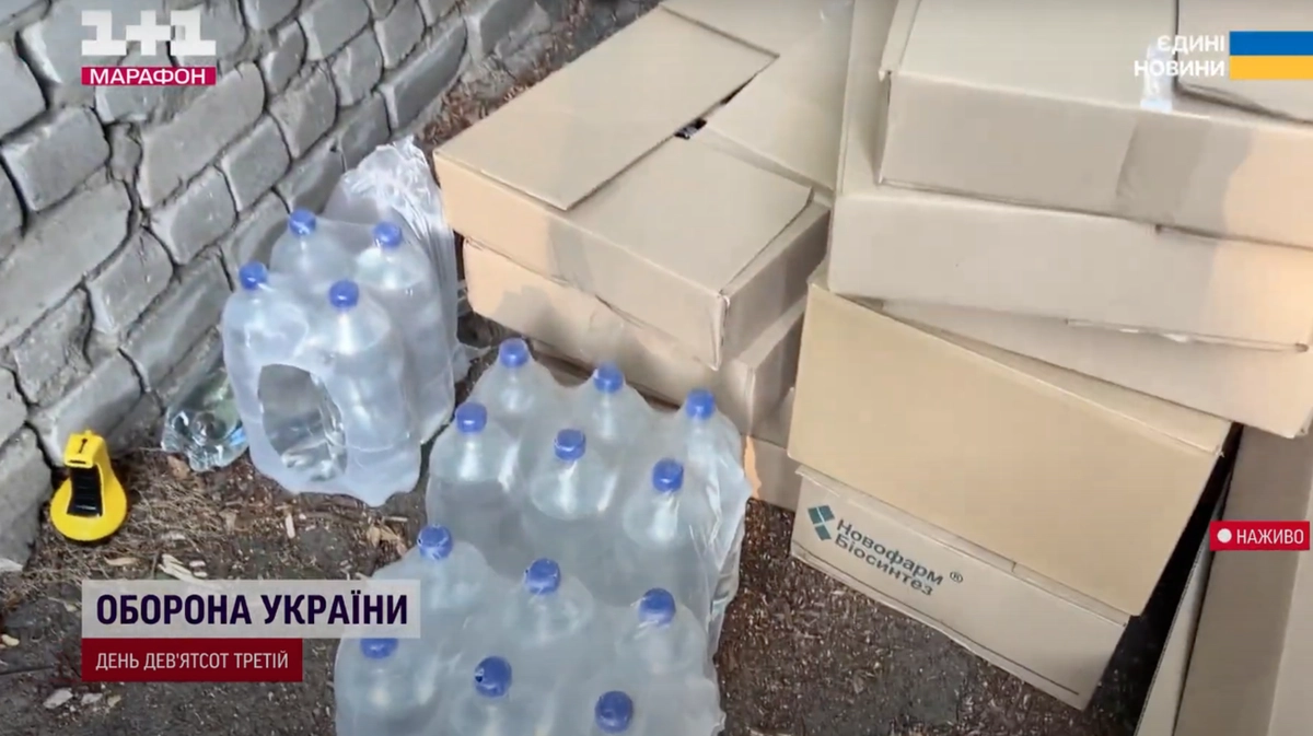 News reports show Ukrainians giving out humanitarian aid to civilians ...